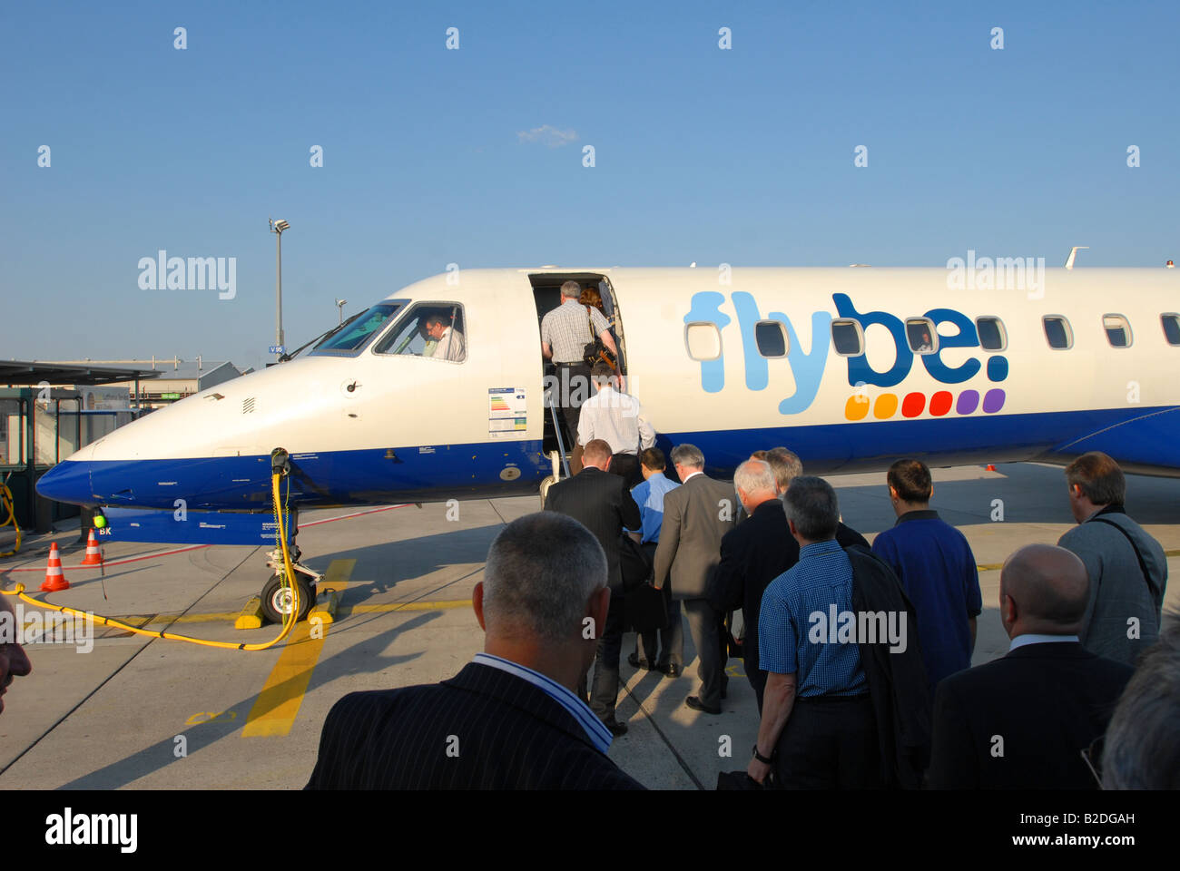 passengers on the steps of a plane Stock Photo - Alamy