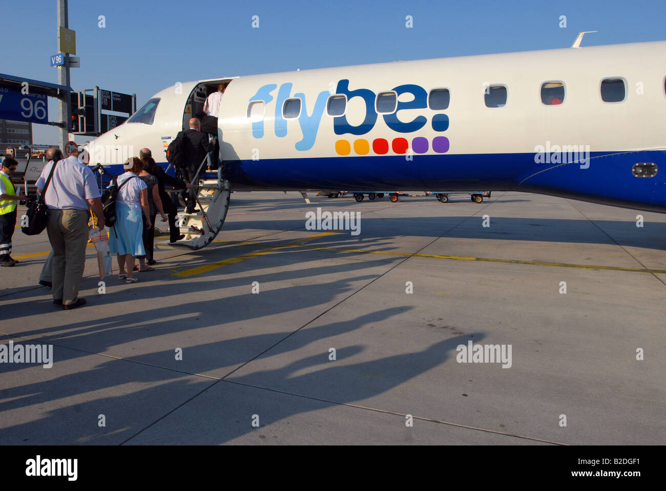 passengers on the steps of a plane Stock Photo - Alamy