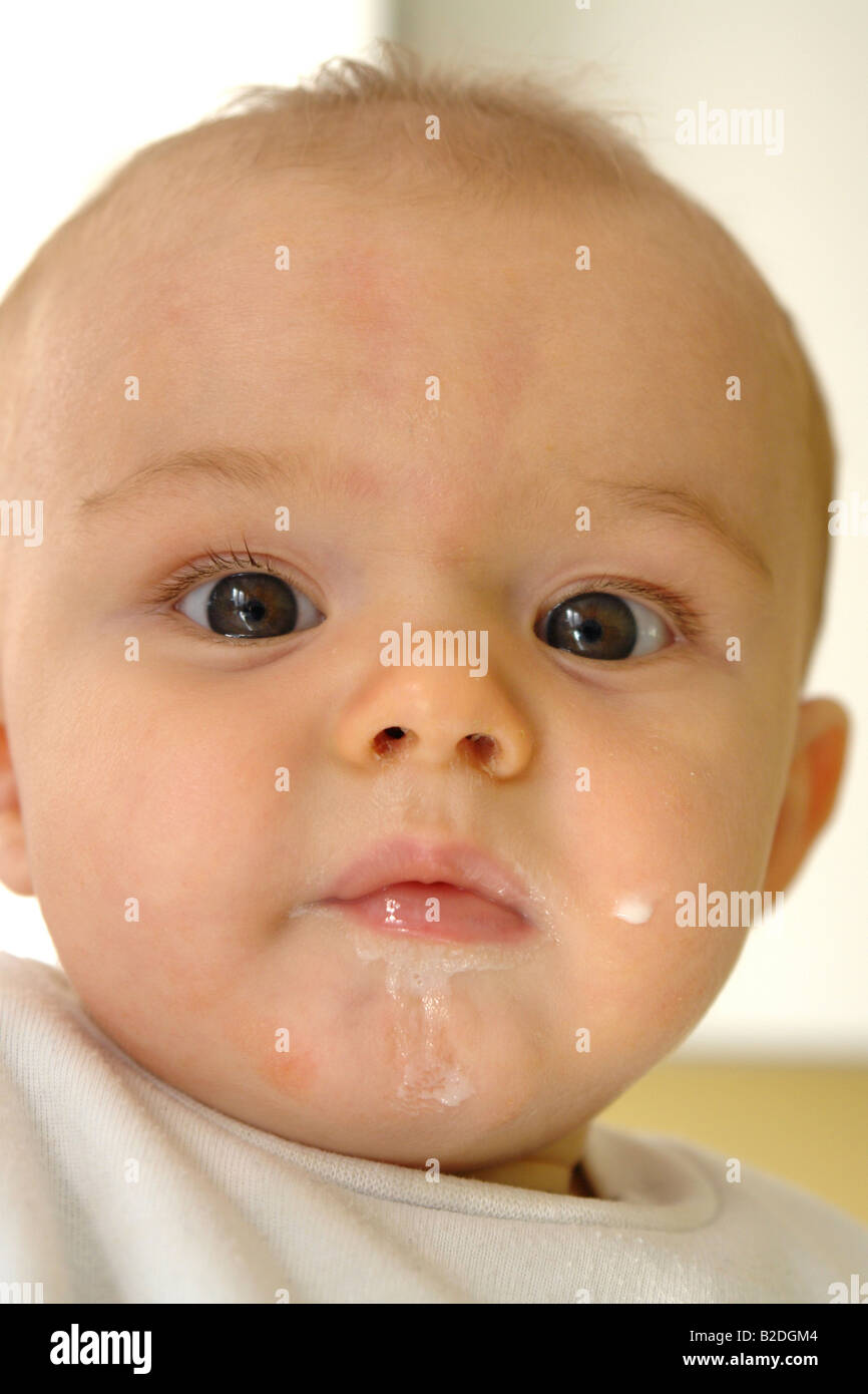 Baby with milk on his face in Newport South Wales GB UK 2008 Stock ...