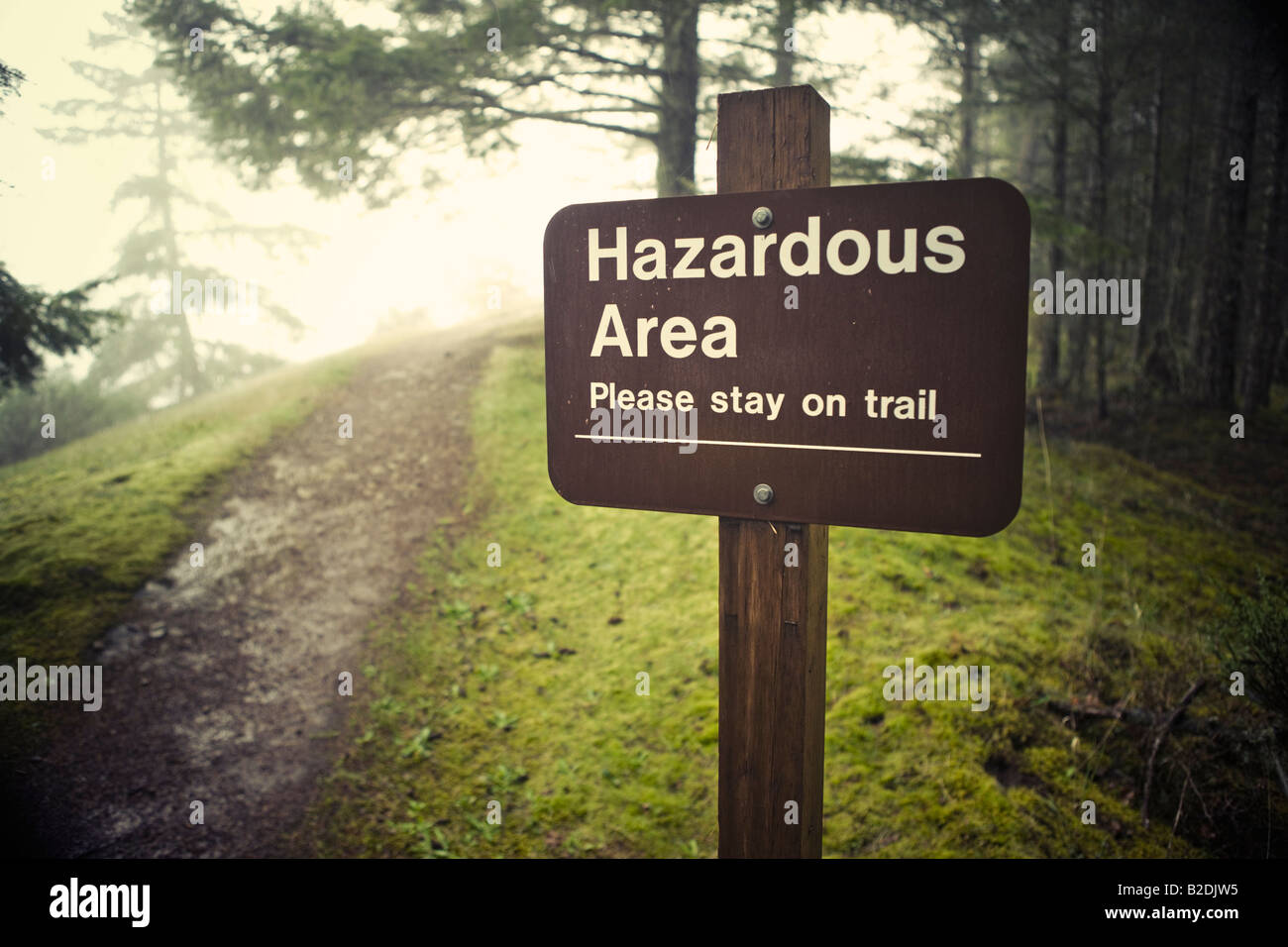 hazardous area warning sign on Bodega Ridge trail Galiano Island Stock ...