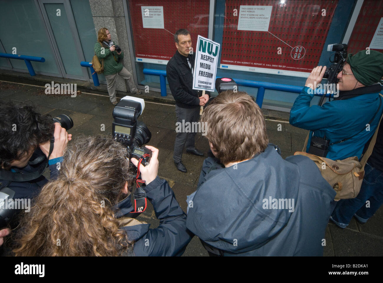 Photographers picture NUJ Gen Secretary Jeremy Dear in front of police ...