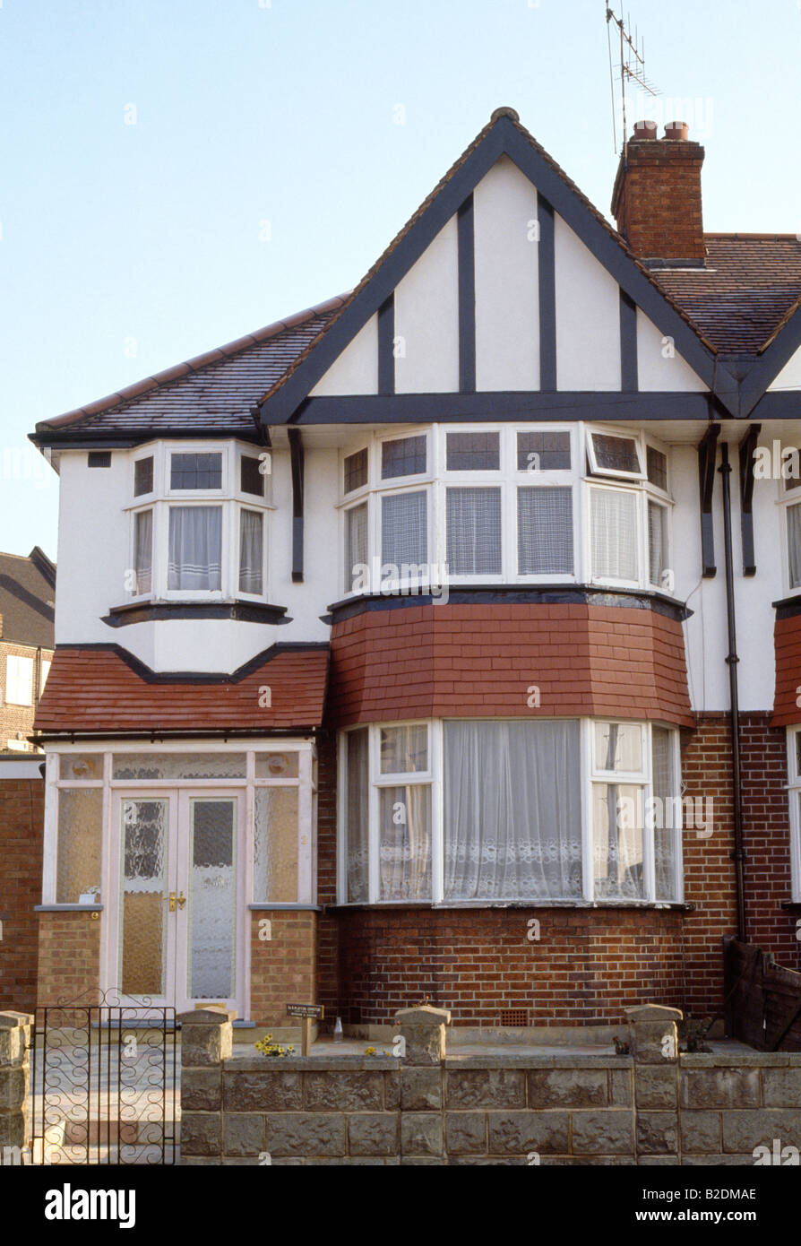 Thirties suburban house with bay windows and timbered gable Stock Photo ...