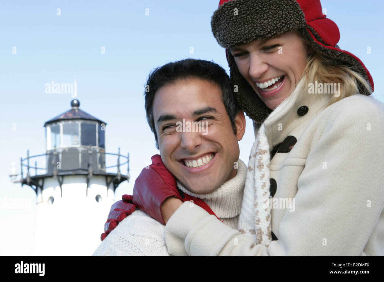 Young woman in front lighthouse hi-res stock photography and images - Alamy
