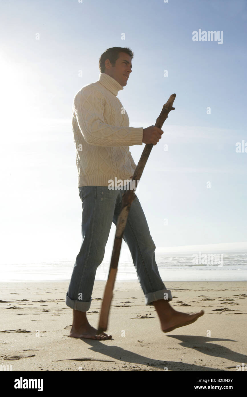 Man with walking stick hi-res stock photography and images - Alamy