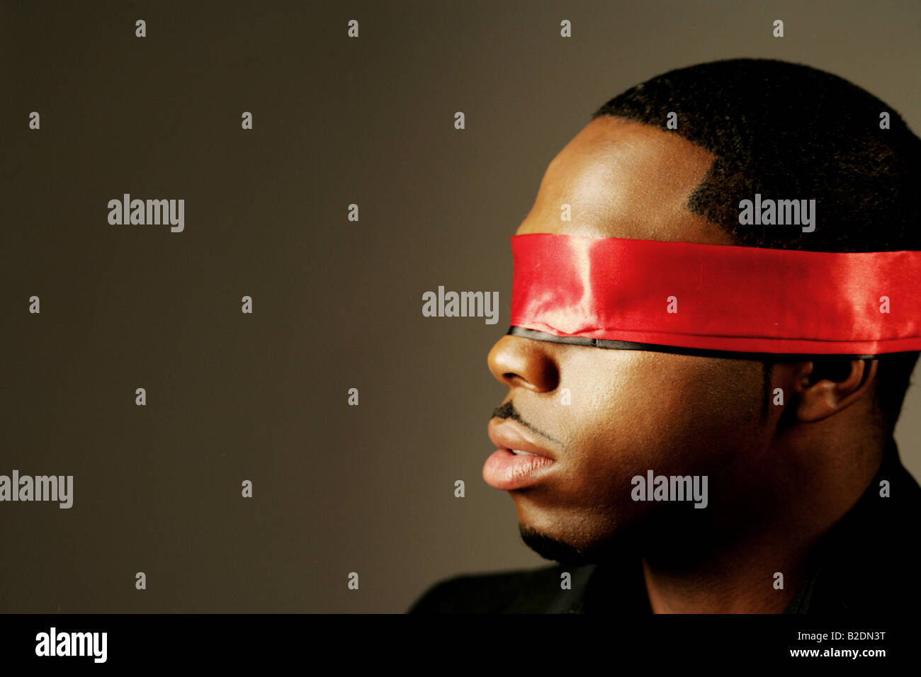 Red scarf blindfold hi-res stock photography and images - Alamy