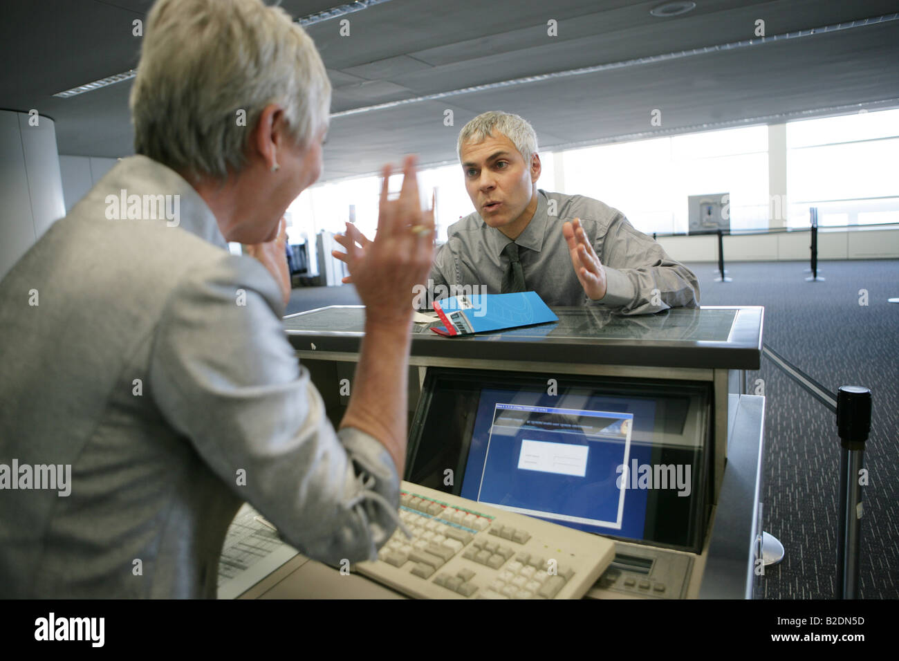 Man angry airport check in hi-res stock photography and images - Alamy