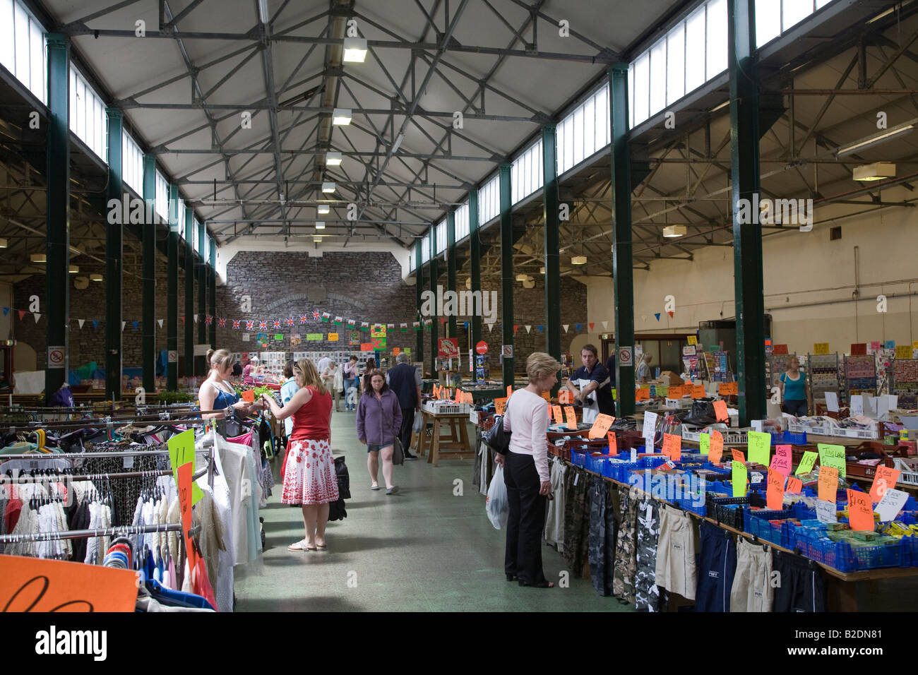People shopping in indoor covered market Brecon Wales UK Stock Photo ...