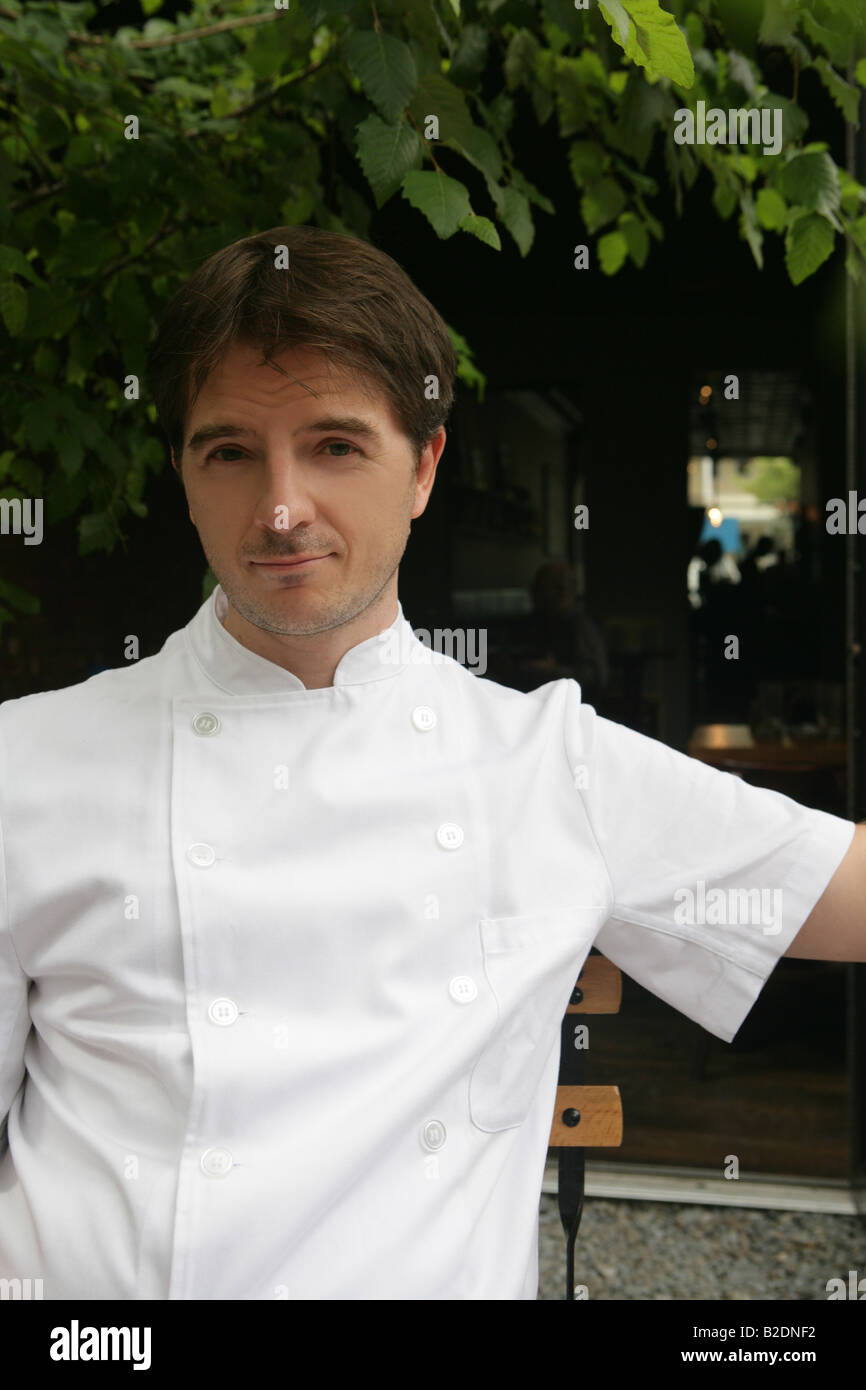 Portrait of male chef outdoors Stock Photo - Alamy