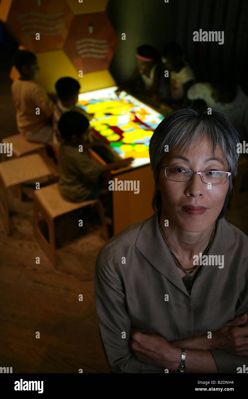 Portrait of art teacher in art class Stock Photo - Alamy