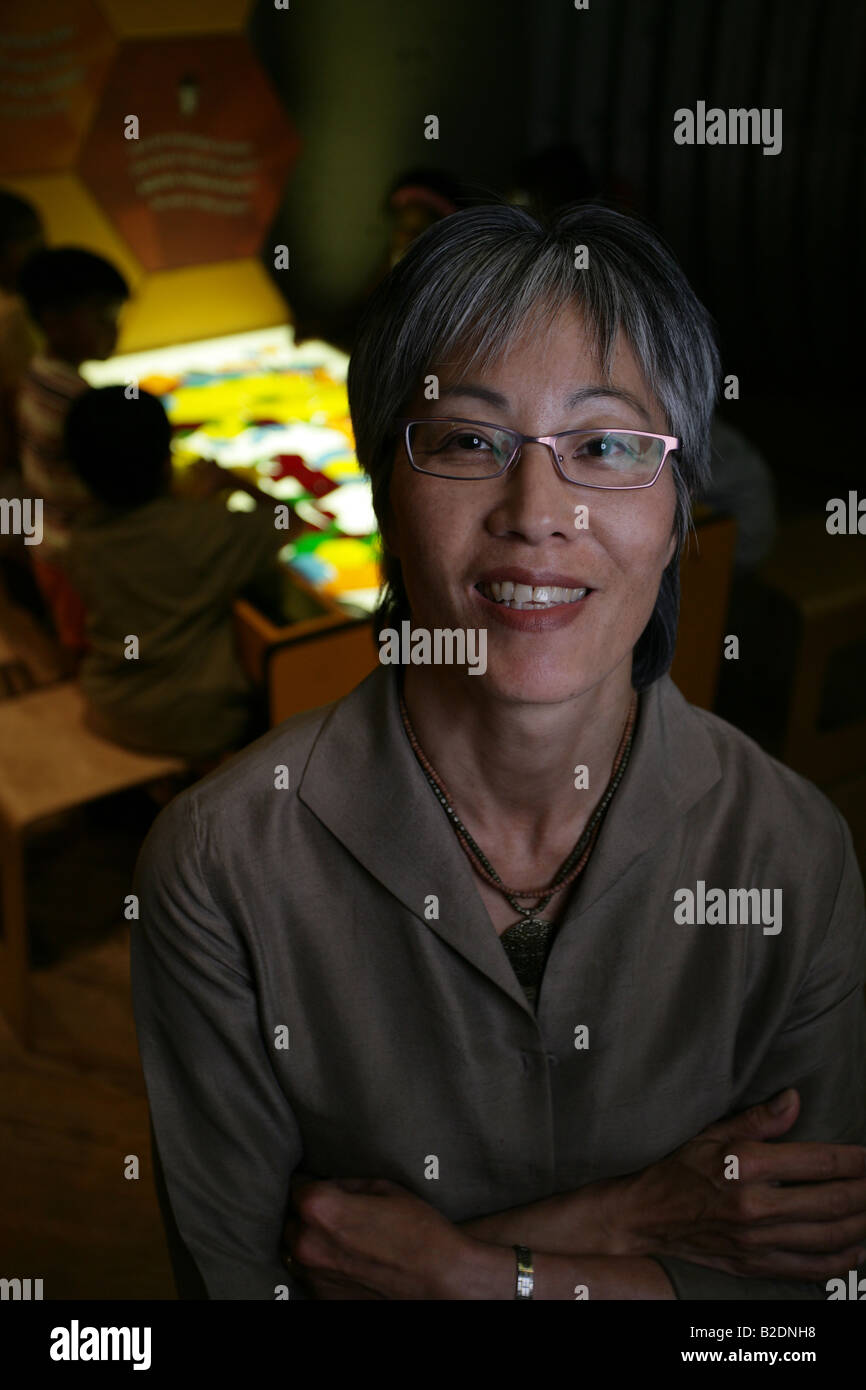 Portrait of art teacher in art class Stock Photo - Alamy