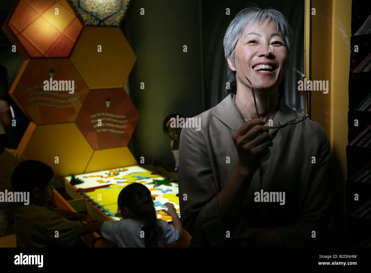 Portrait of art teacher in art class Stock Photo - Alamy