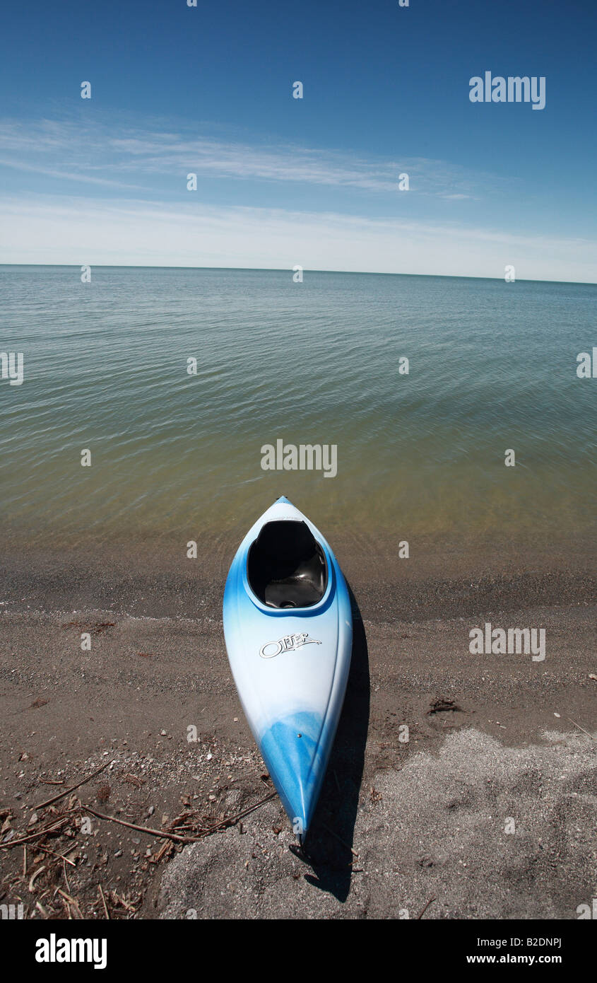 Kayak at waters edge on Lake Winnipeg Stock Photo - Alamy