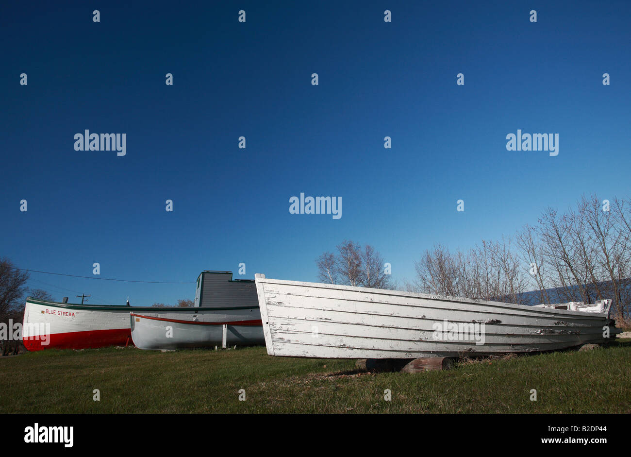 beached fishing boats at Hecla on Lake Winnipeg Stock Photo - Alamy