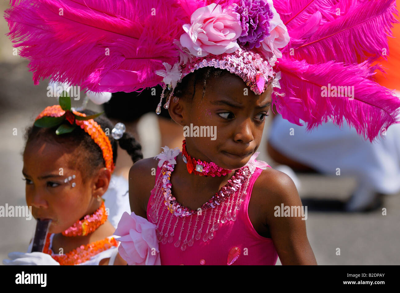 Hot pink blacgirl with freezie grimacing in costumes getting ready to ...
