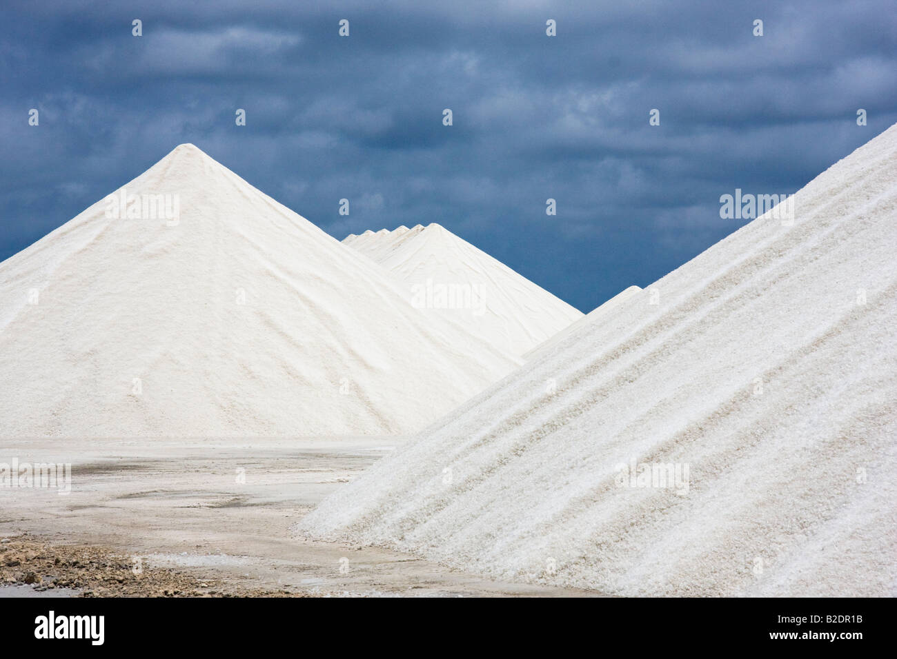 Mountains of salt at the salt flats of Pekelmeer, Bonaire Island ...