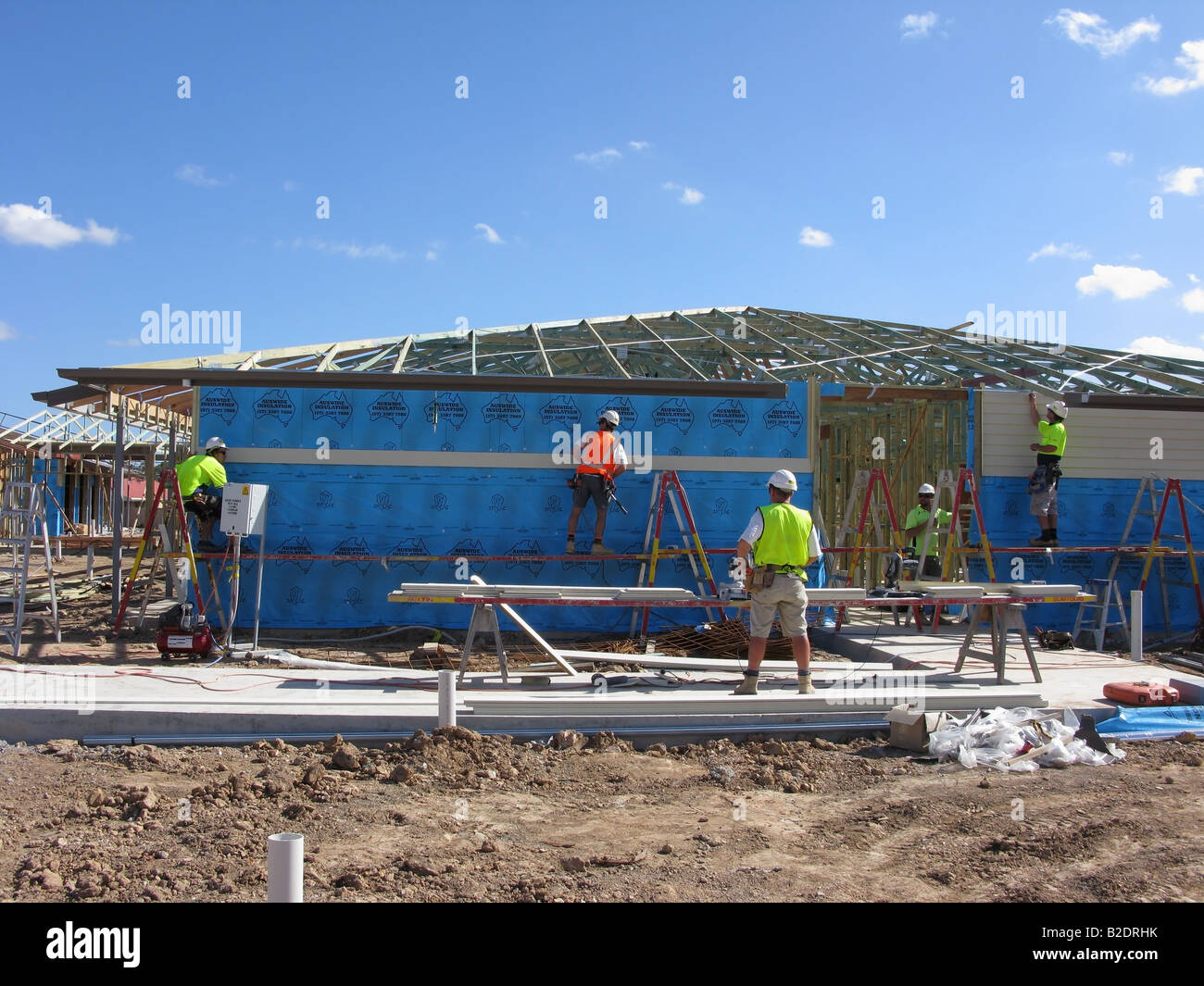 Australian workers building a house Stock Photo - Alamy