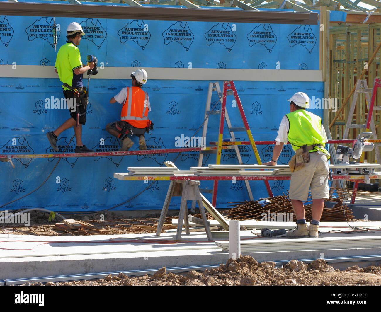 Australian workers building a house Stock Photo - Alamy