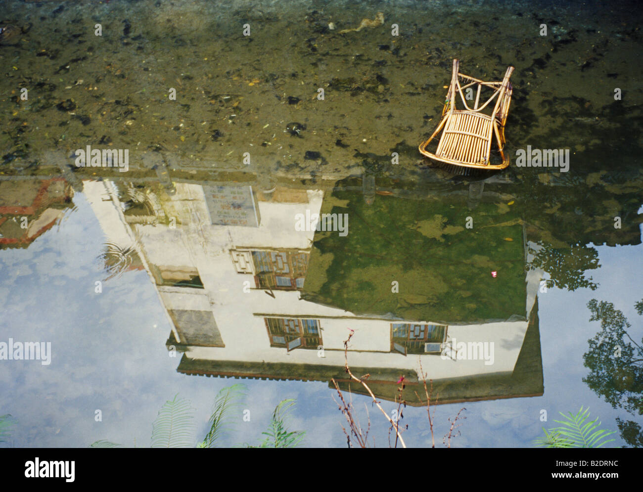 Chair dumped in puddle hi-res stock photography and images - Alamy