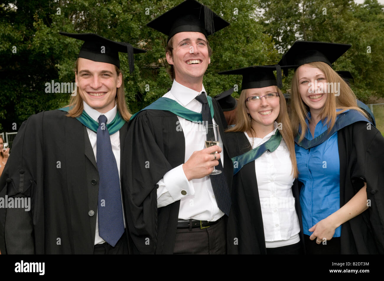 Aberystwyth University graduation day - four graduates two men two ...