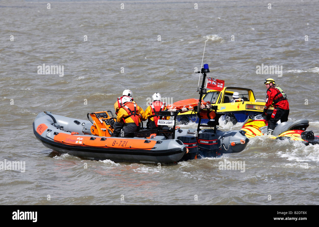 RNLI Lifeboat B721 Rock Light and Lifeguard on jetski in attendance on ...