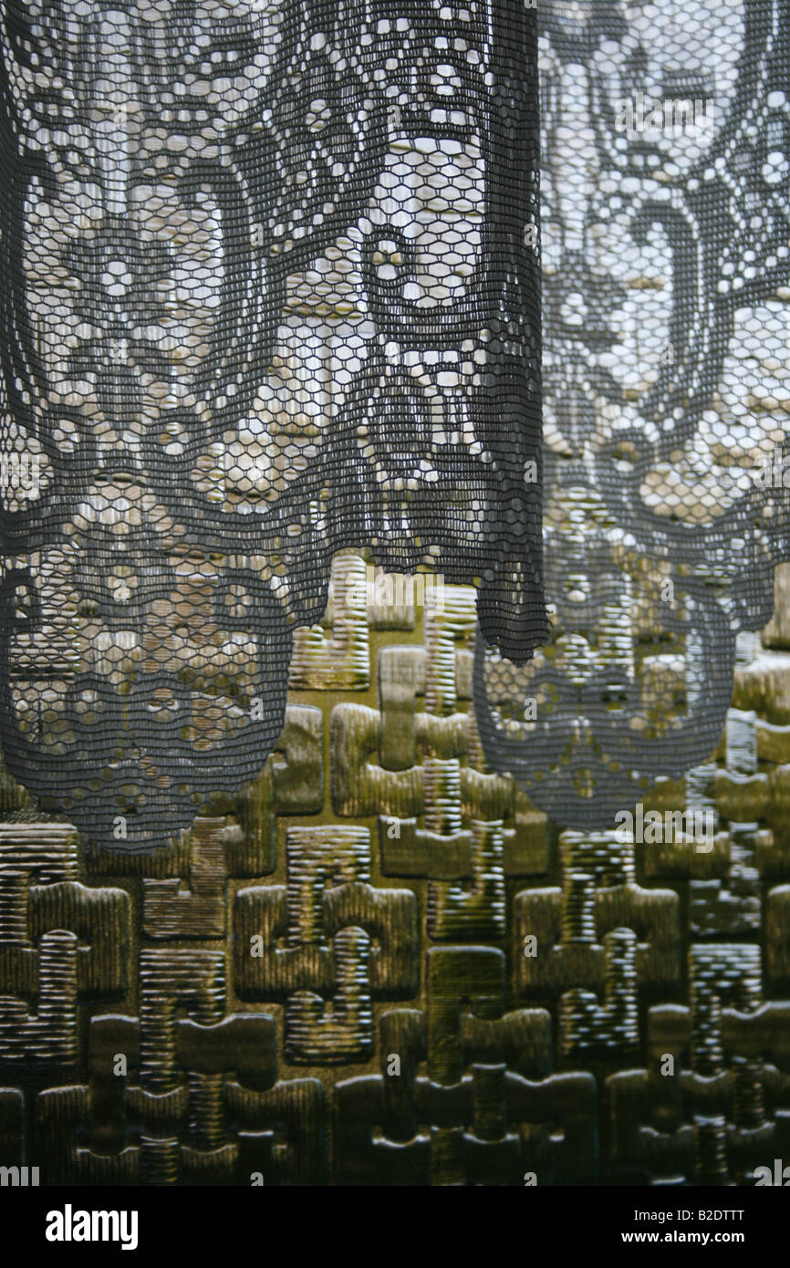 pattern glass window with lace net curtains Stock Photo - Alamy