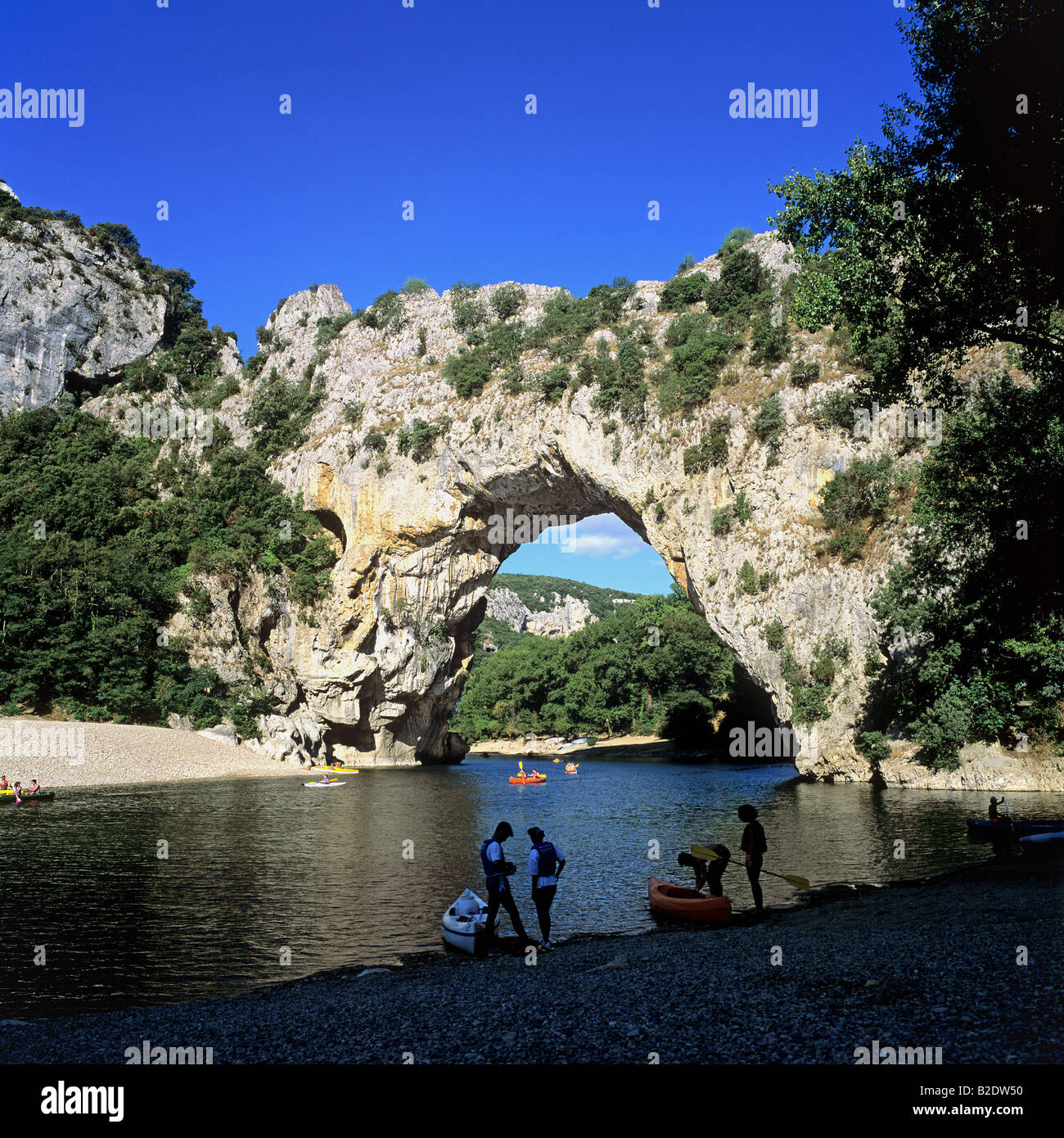Vallon Pont d'Arc rocky arch and canoes on Ardèche river Gorges de l ...