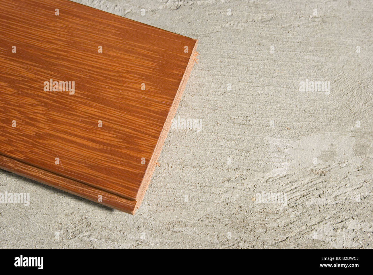 timber on concrete floor Stock Photo - Alamy