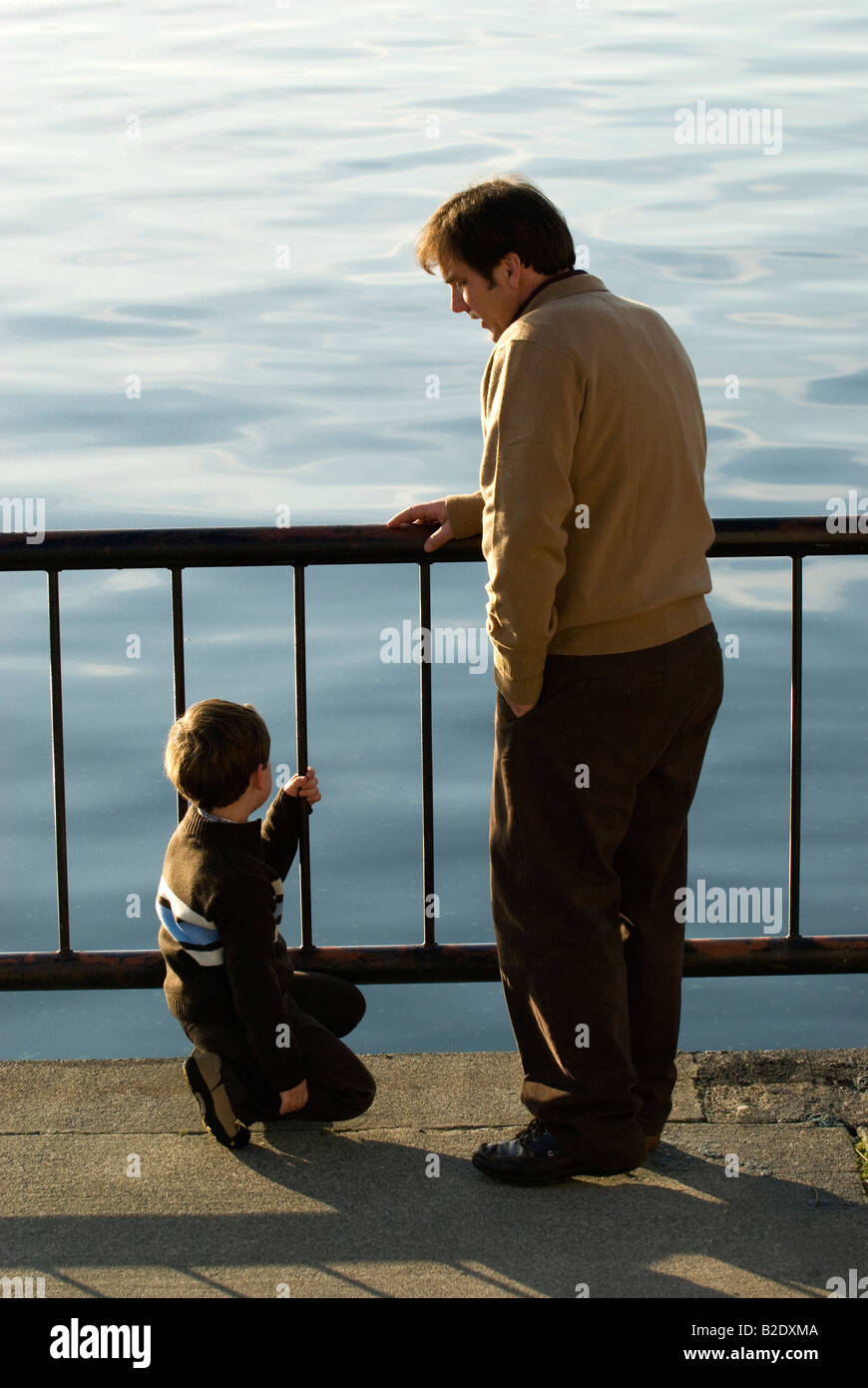 Father talking to his son Stock Photo - Alamy