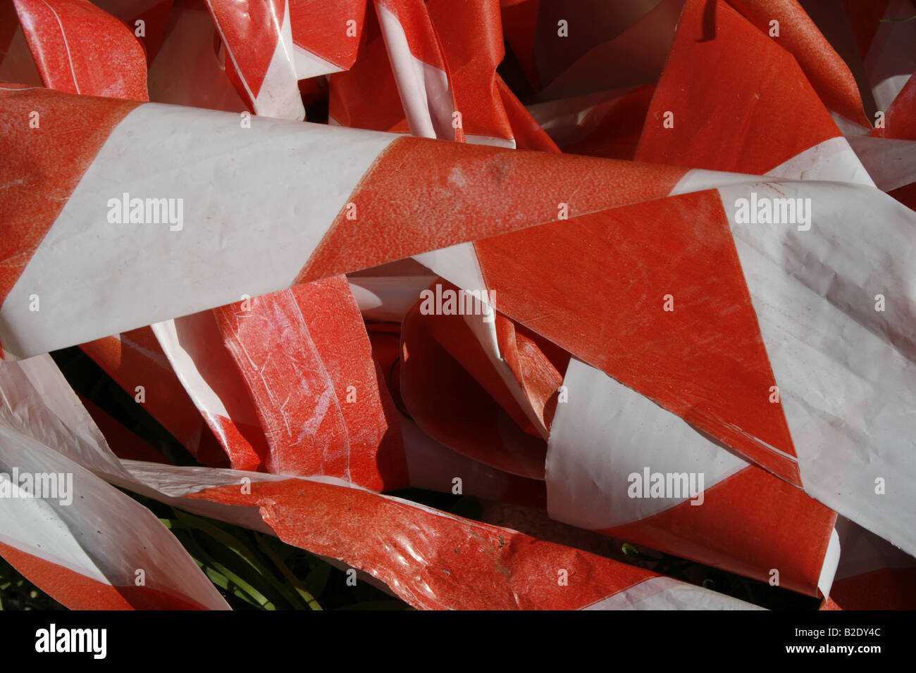 close up of red white plastic tape barrier cordon Stock Photo - Alamy