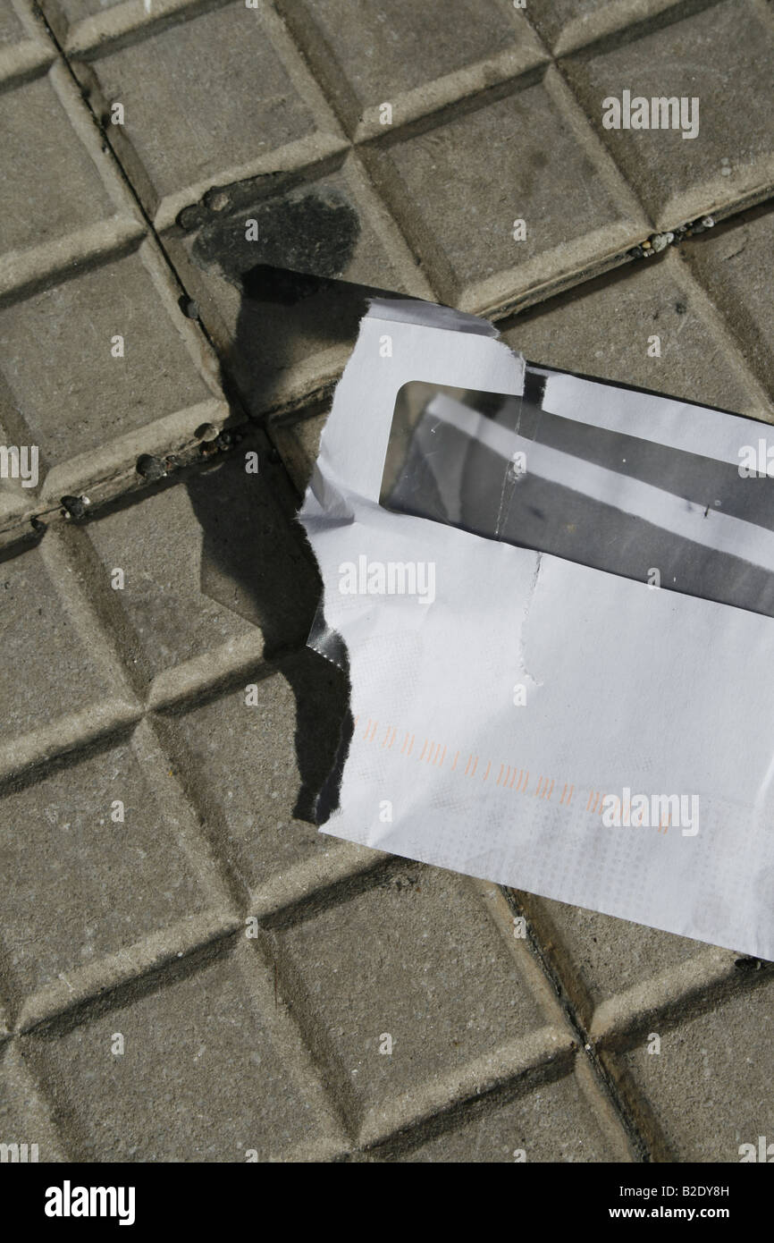 opened letter on envelope on ground in street Stock Photo - Alamy