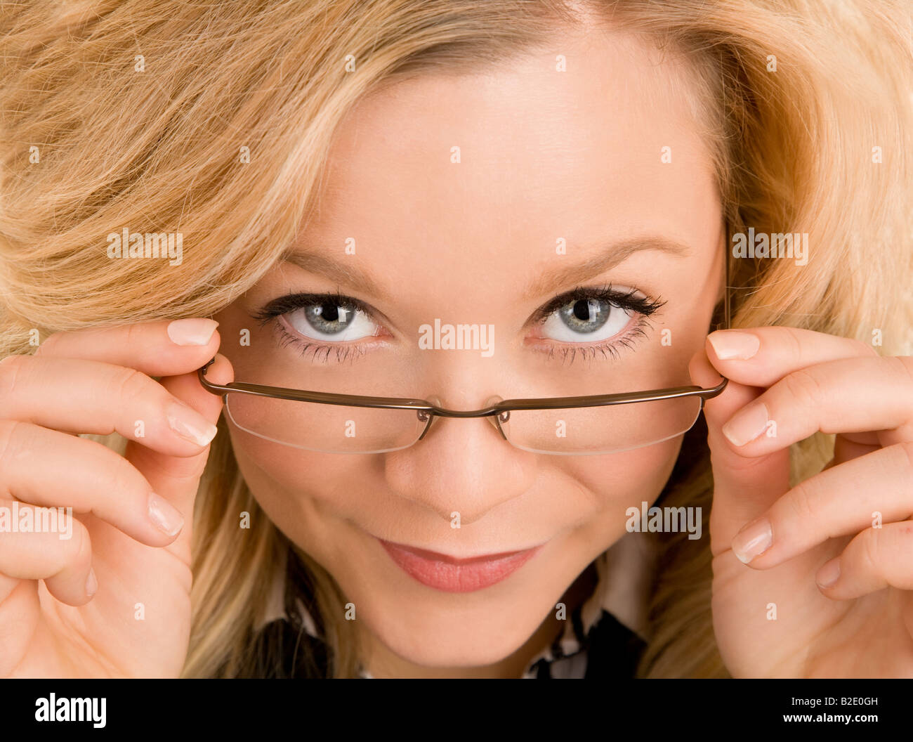 Hand over eyes peeking woman hi-res stock photography and images - Alamy
