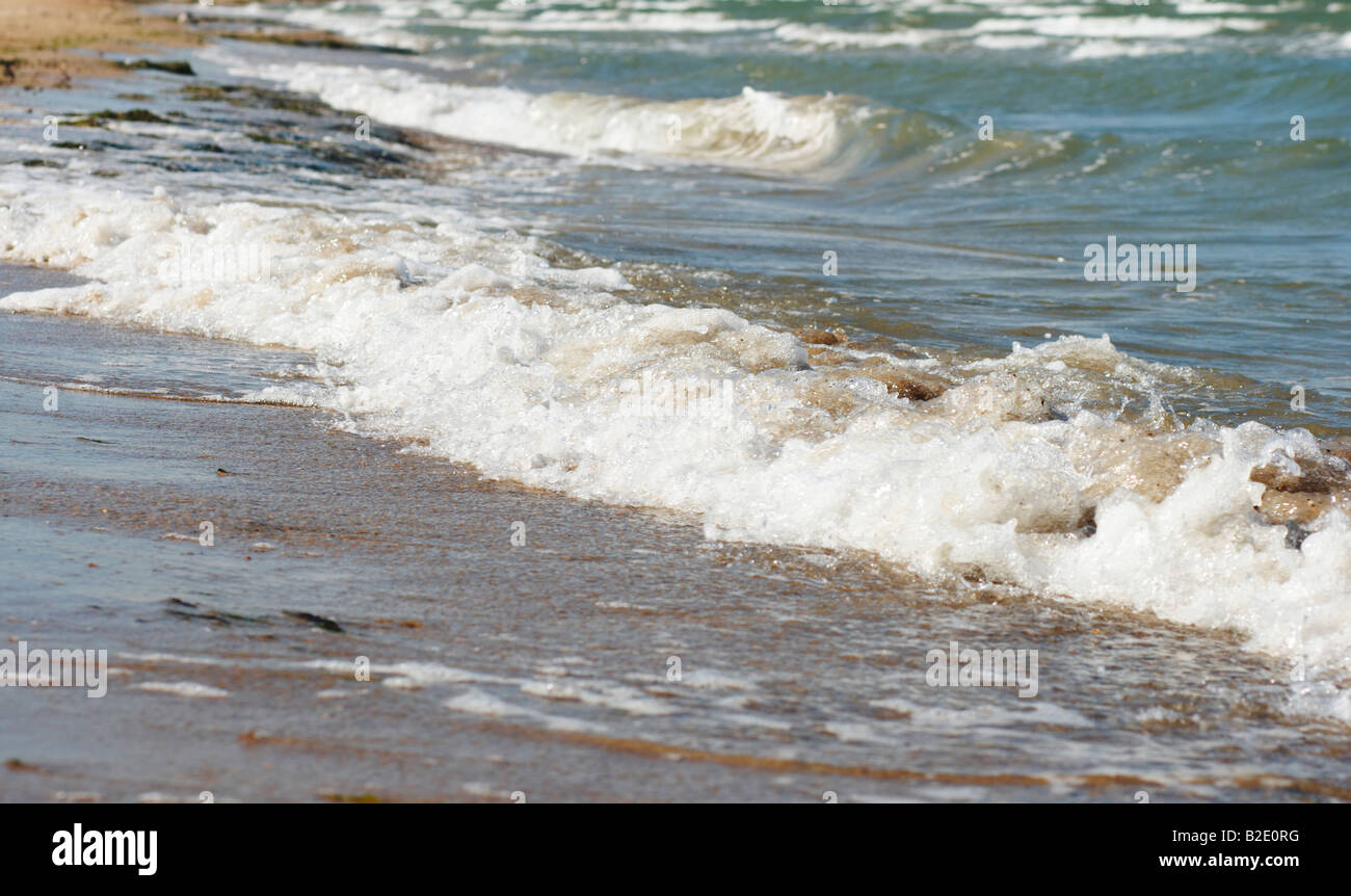 Surf waves and summer sea surface Stock Photo - Alamy