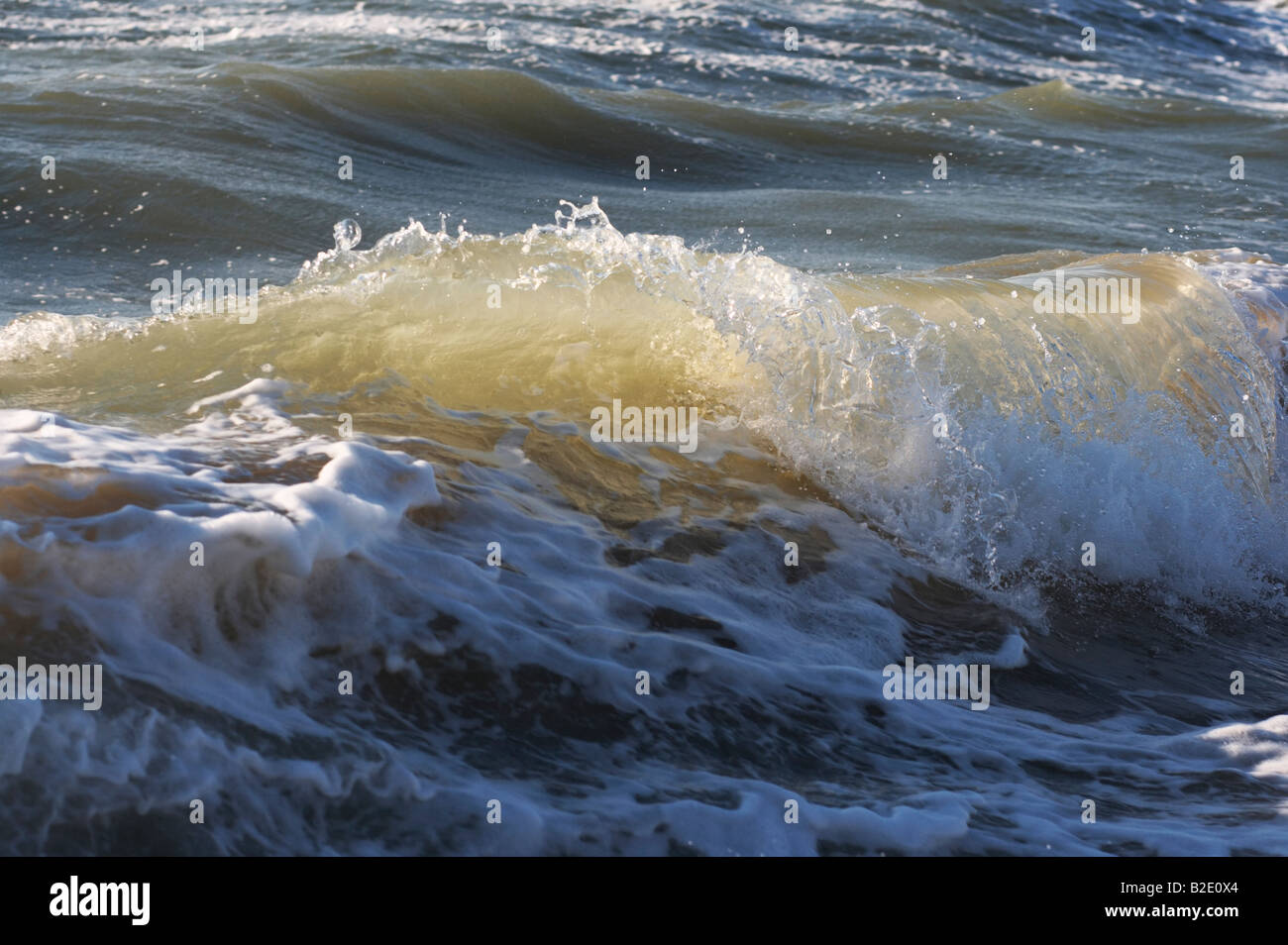 Sea surf great wave break on coastline Stock Photo - Alamy