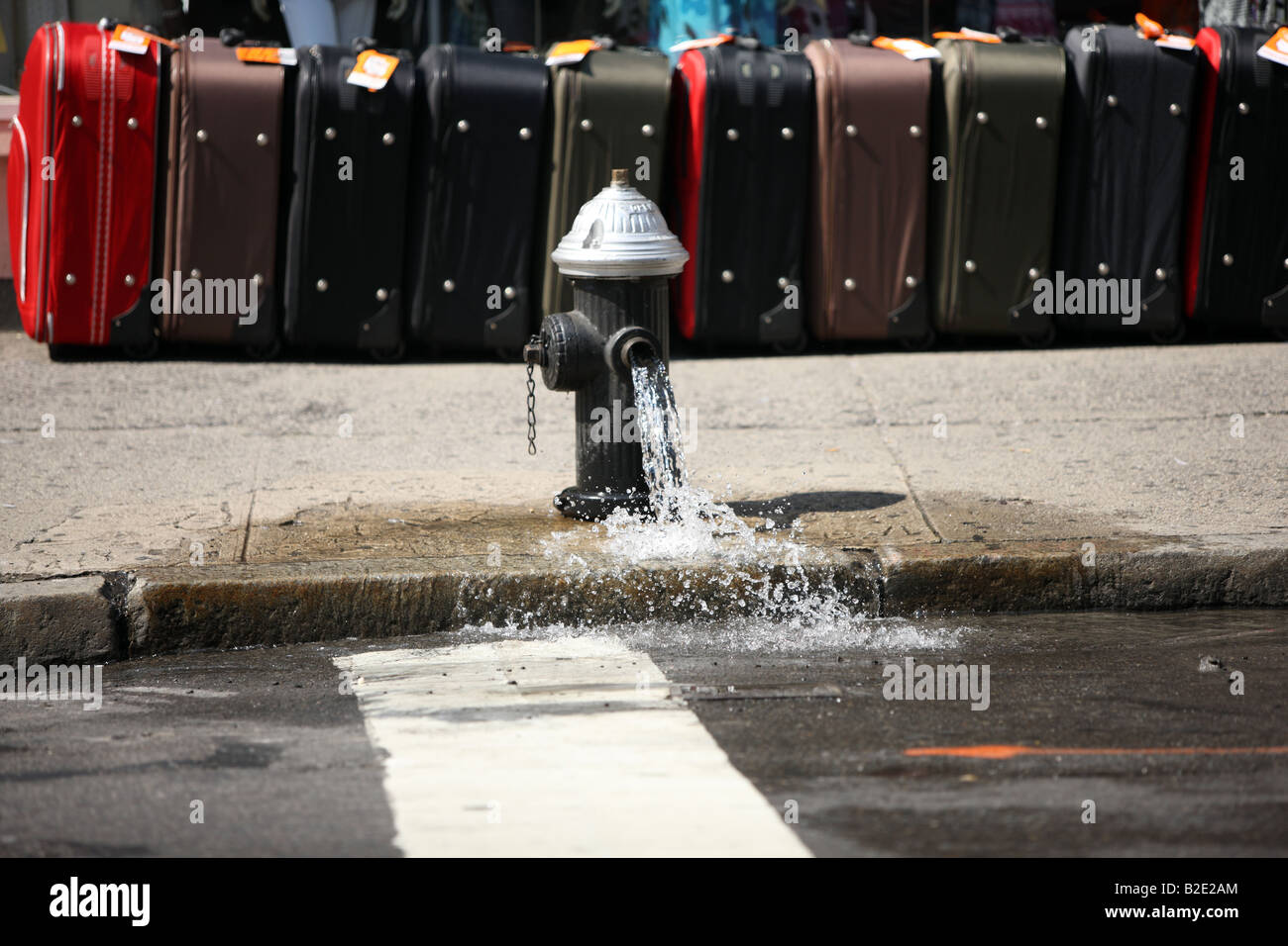 Fire Hydrant leaking water in Manhattan, New York Stock Photo - Alamy