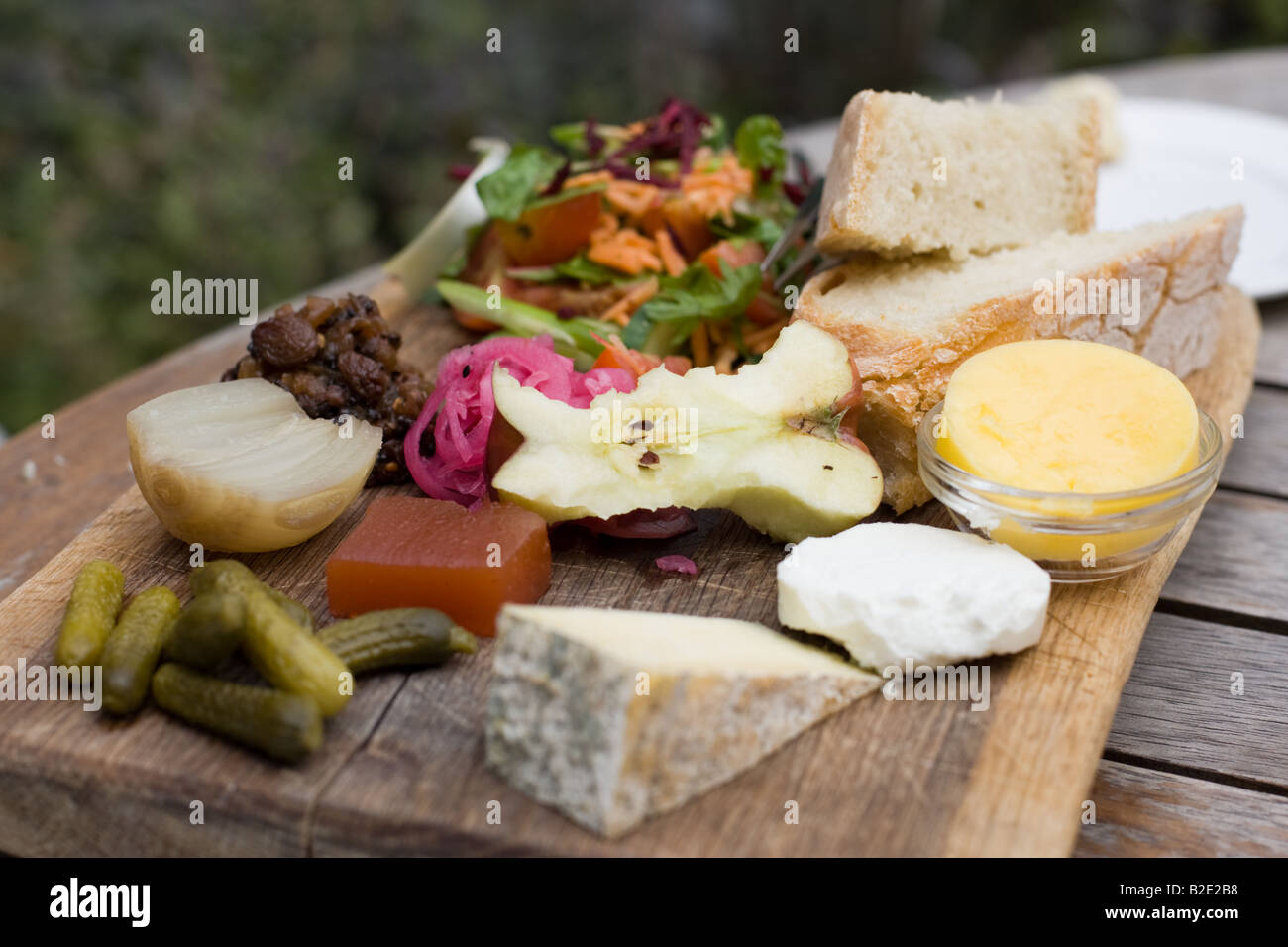 Ploughmans lunch on a wooden board Stock Photo - Alamy