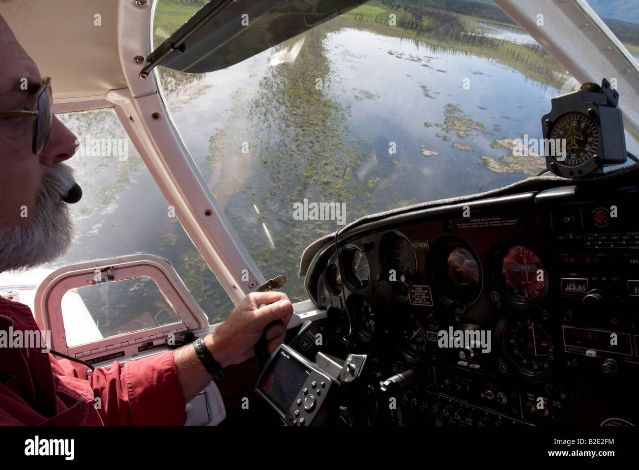 Flight seeing trip with small air plane plane over the Knik River ...