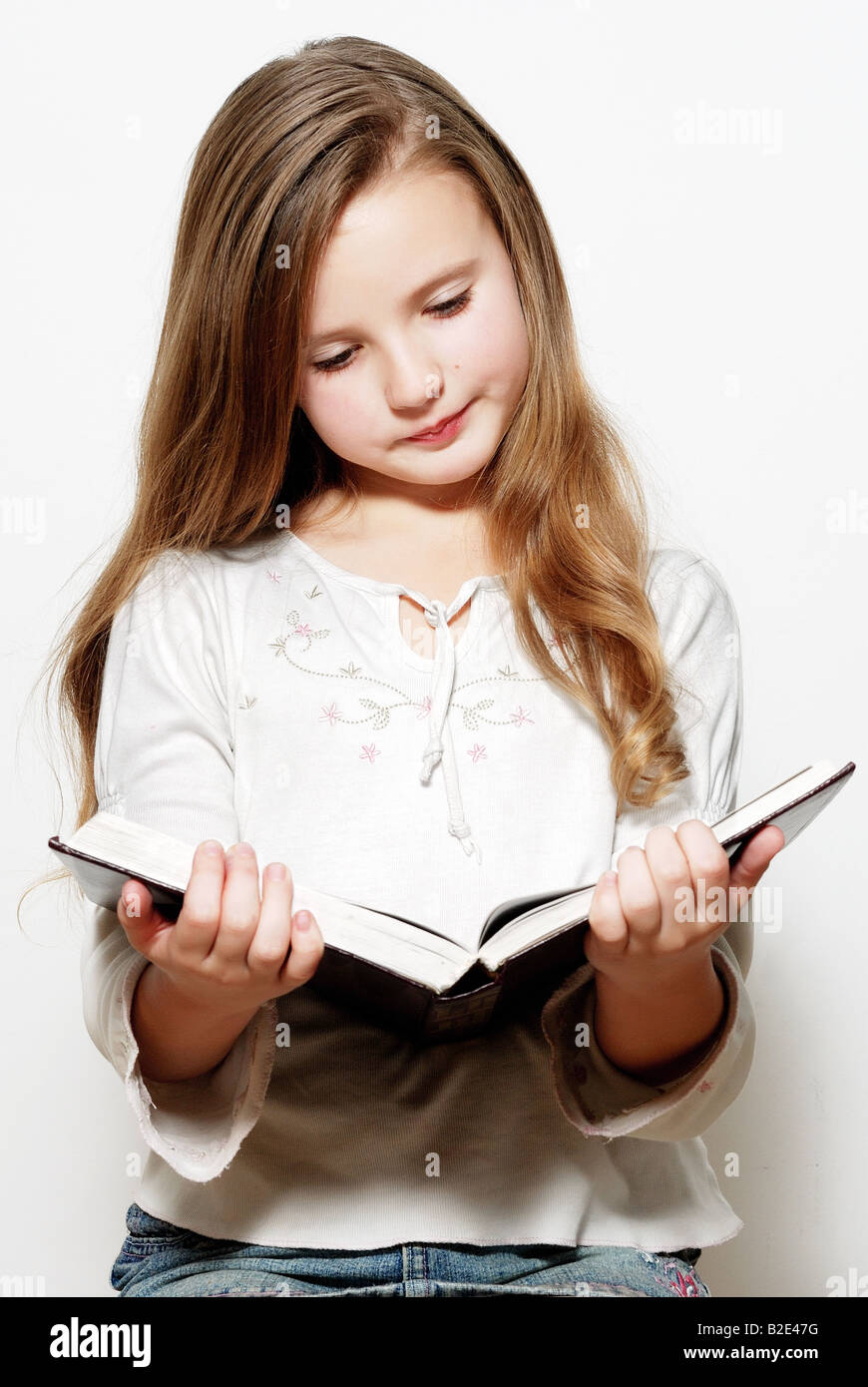 The girl reading a book Stock Photo - Alamy