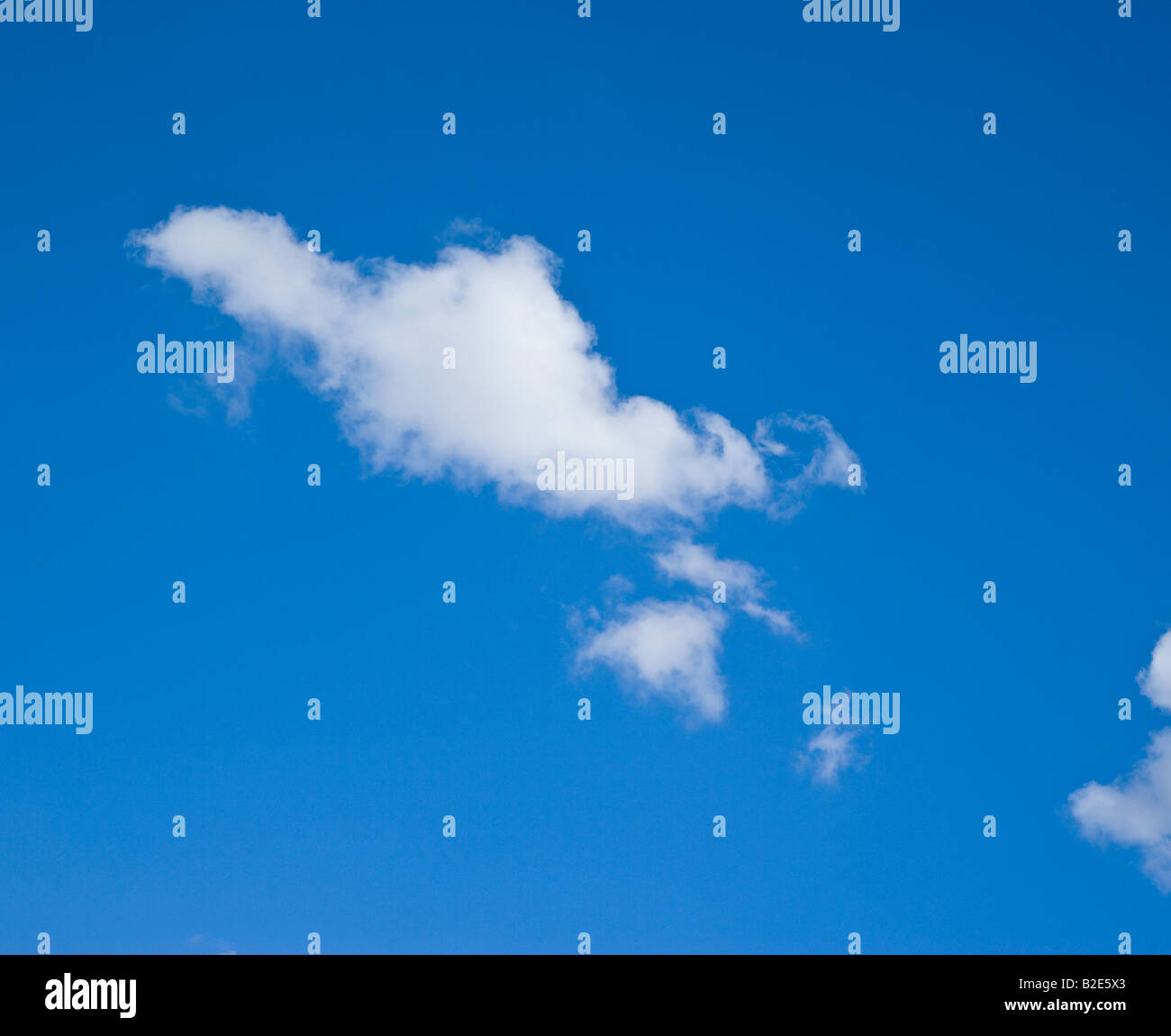 Fluffy white cloud in blue sky Stock Photo - Alamy