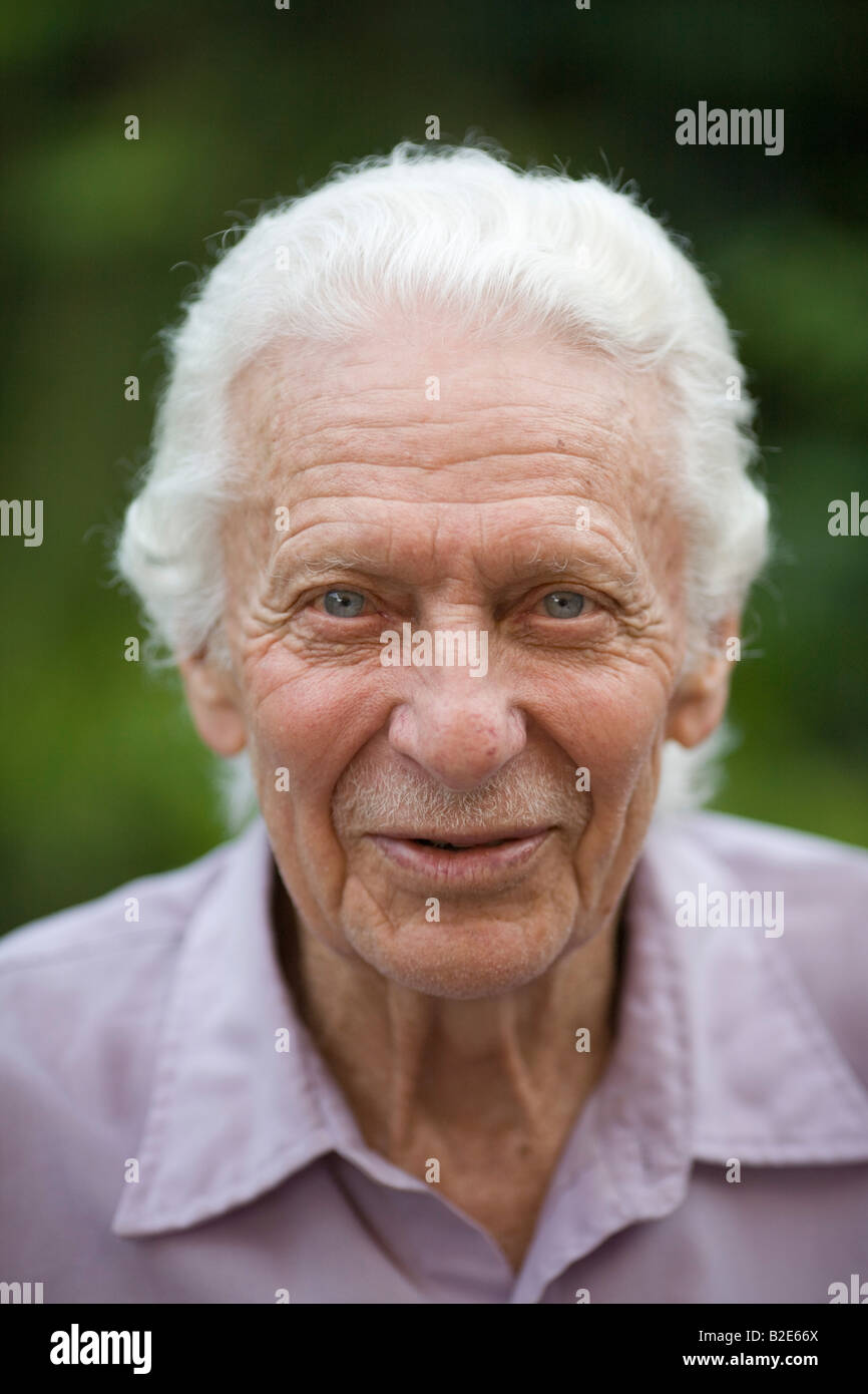 Elderly happy male headshot Stock Photo - Alamy