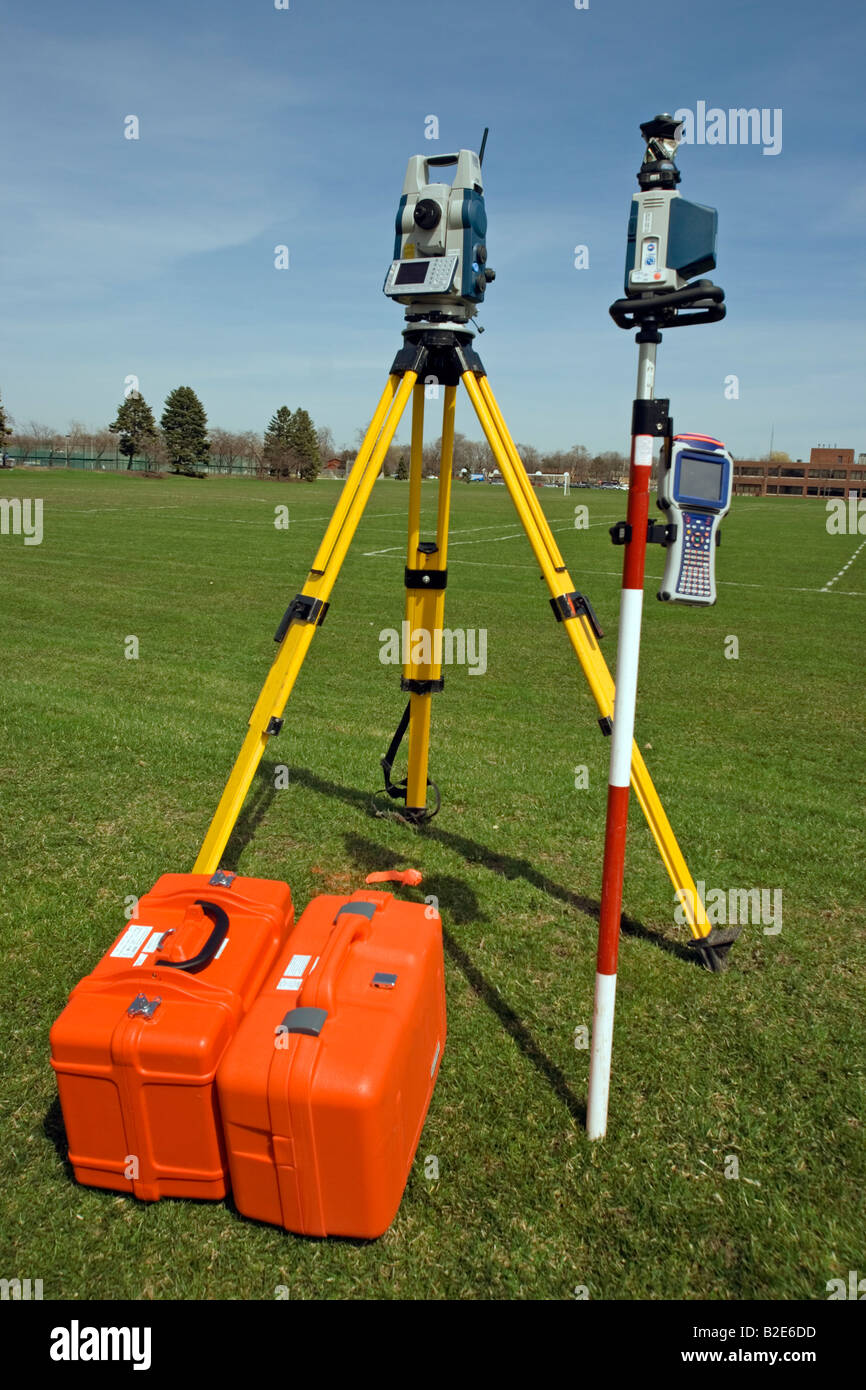 Robotic station with a prism pole ready for work Stock Photo - Alamy