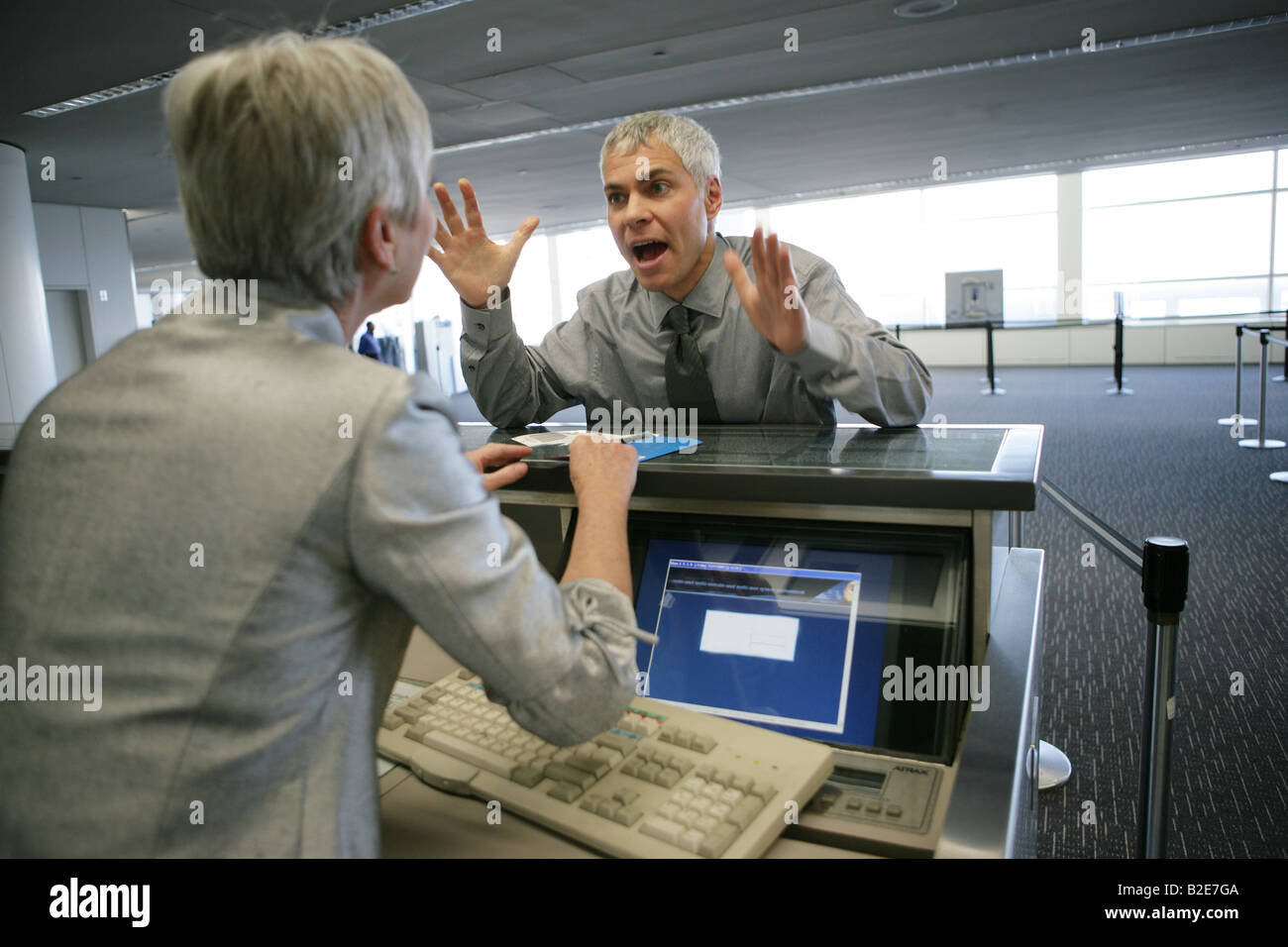 Airport counter angry hi-res stock photography and images - Alamy