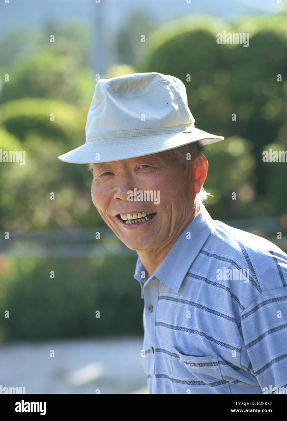 Portrait of an elderly Japanese man Stock Photo - Alamy
