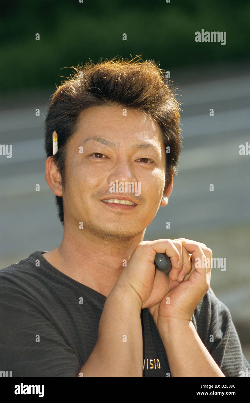 A young Japanese carpenter Stock Photo - Alamy