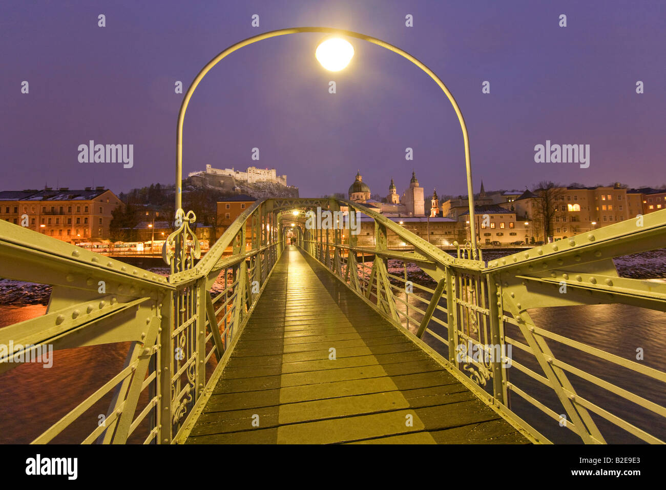 Footbridge across river Salzach River Mozartsteg Bridge Hohensalzburg ...