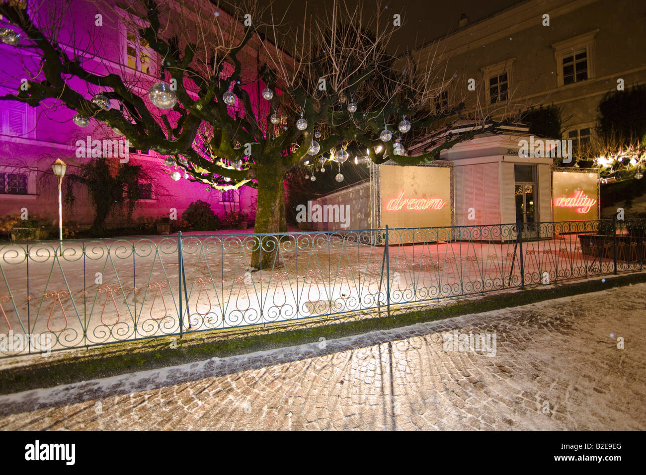 Coffeehouse lit up at night Stock Photo - Alamy