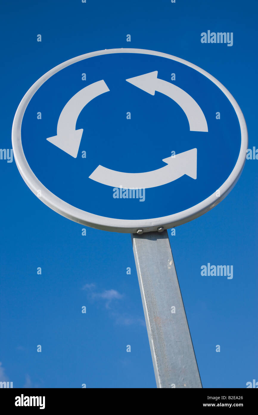 Traffic sign signifying roundabout Stock Photo - Alamy