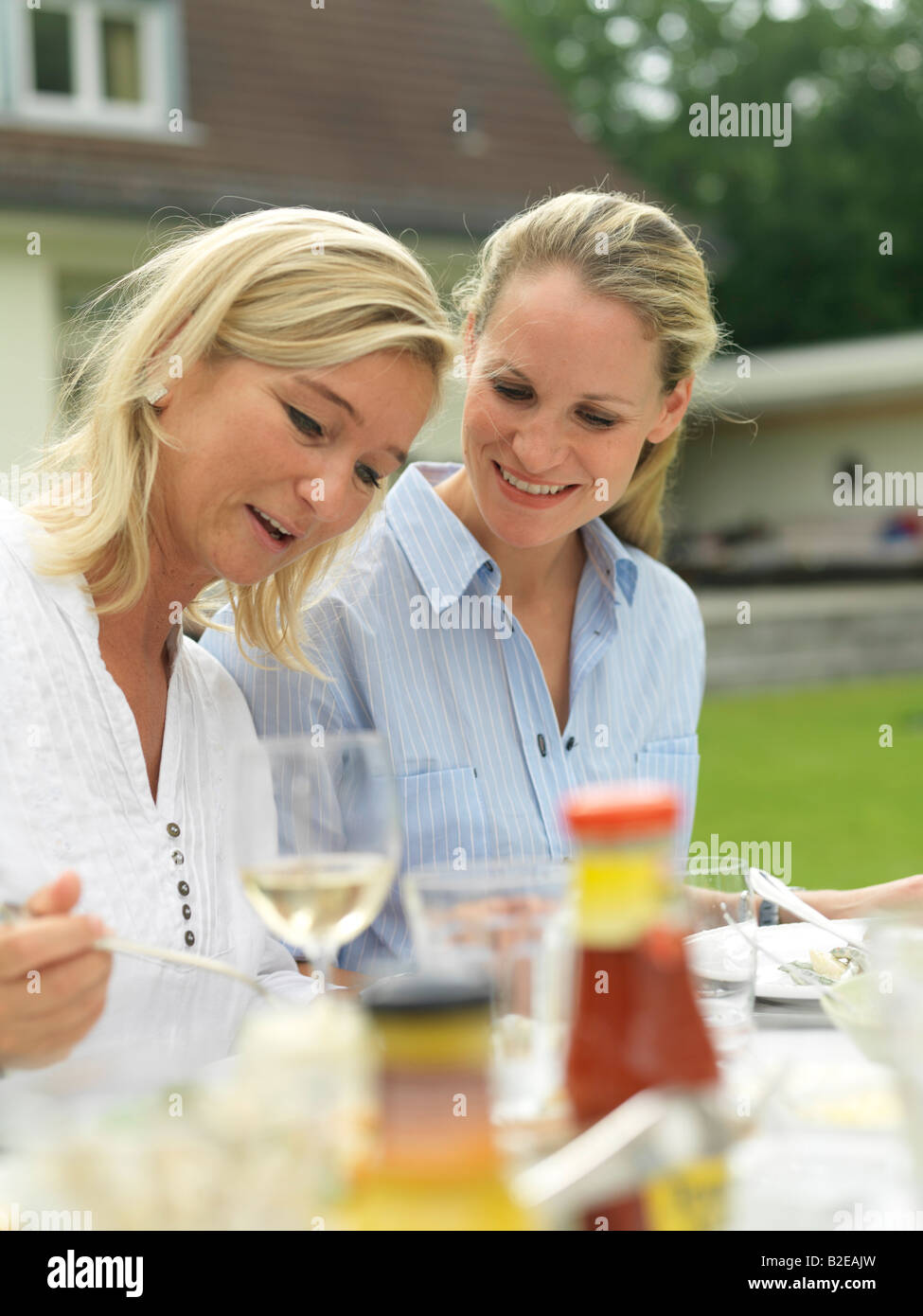Two women at the table hi-res stock photography and images - Alamy