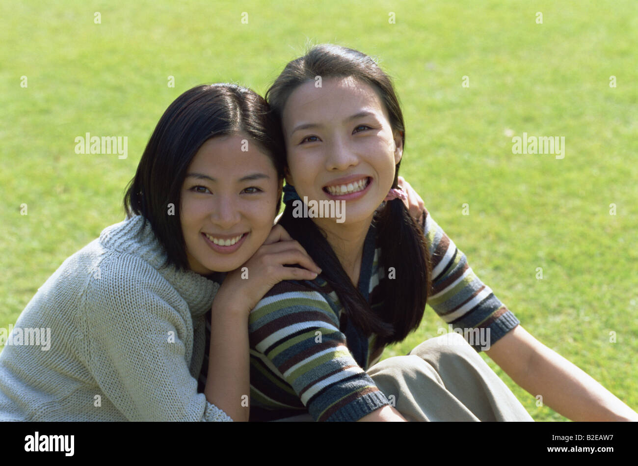 Two young Asian women Stock Photo - Alamy