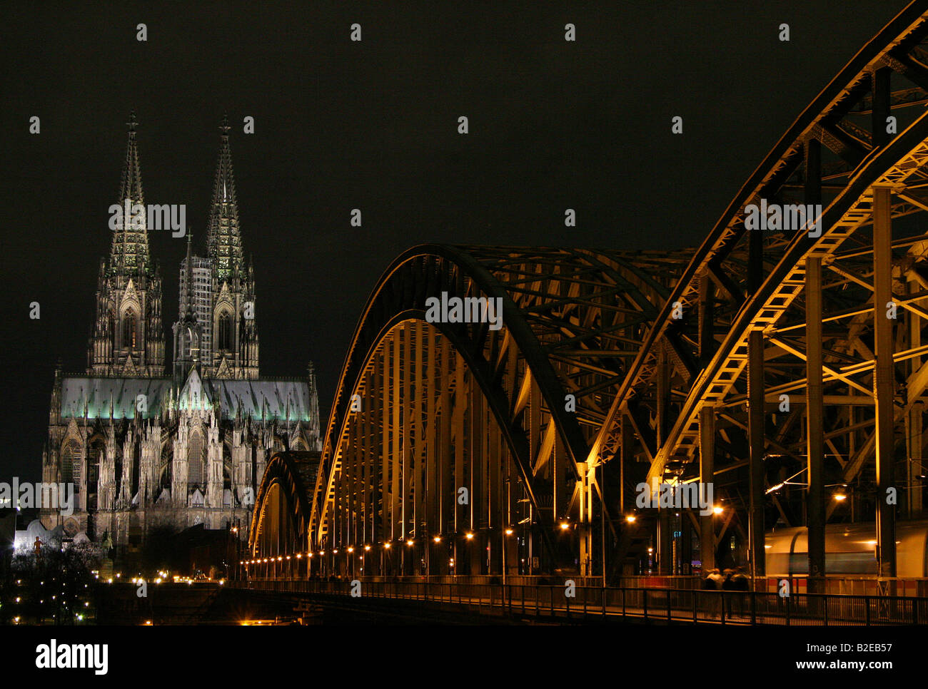 Cathedral and bridge lit up at night Hohenzollern Bridge Cologne ...