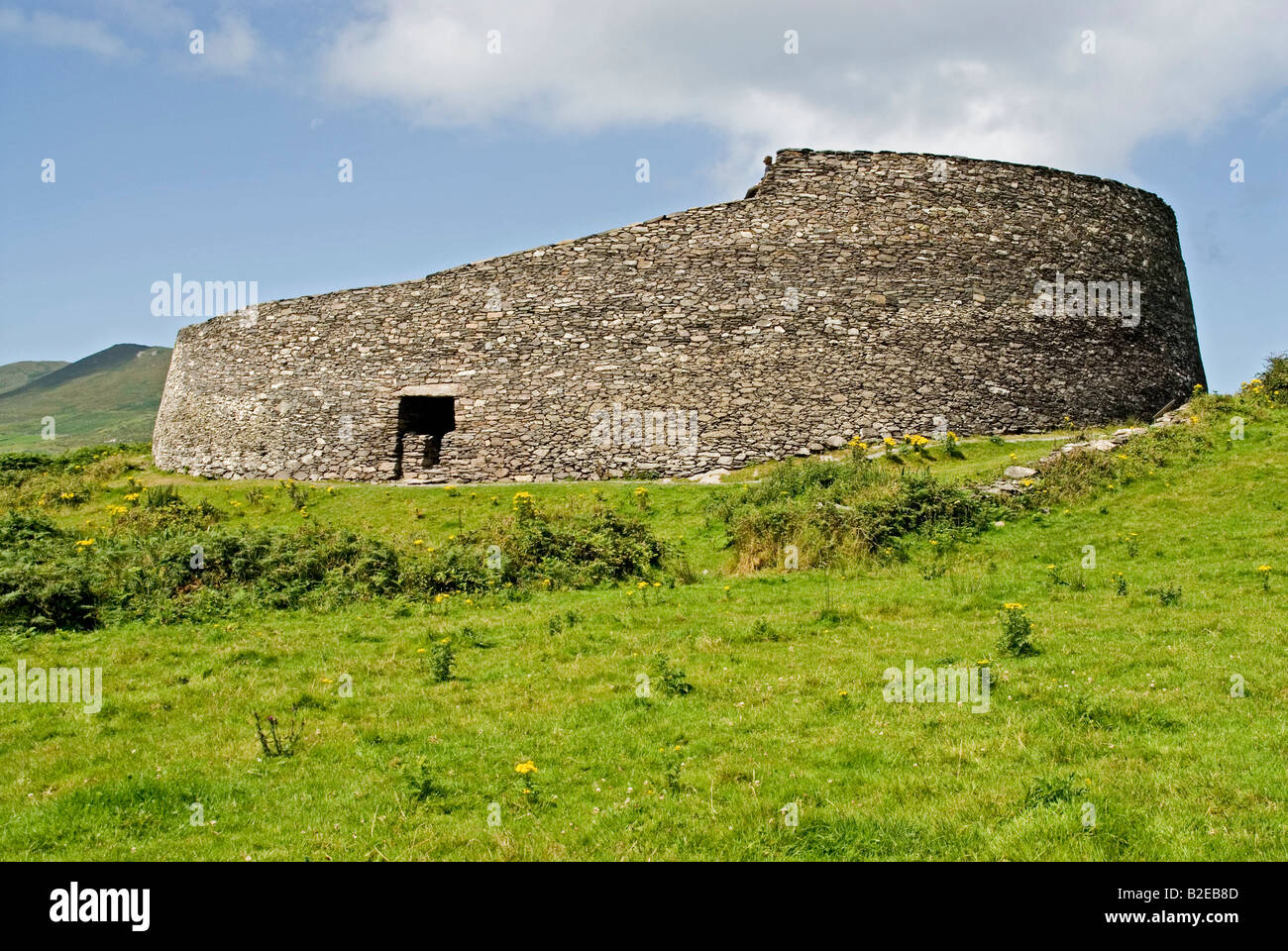 Low angle view of fort on hill, Cahergall Stone Fort, Iveragh Peninsula ...